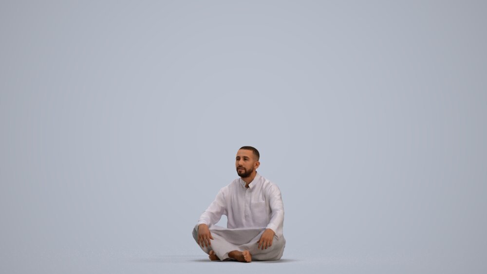 Man in White Traditional Clothing Sitting Cross-Legged on a Plain ...